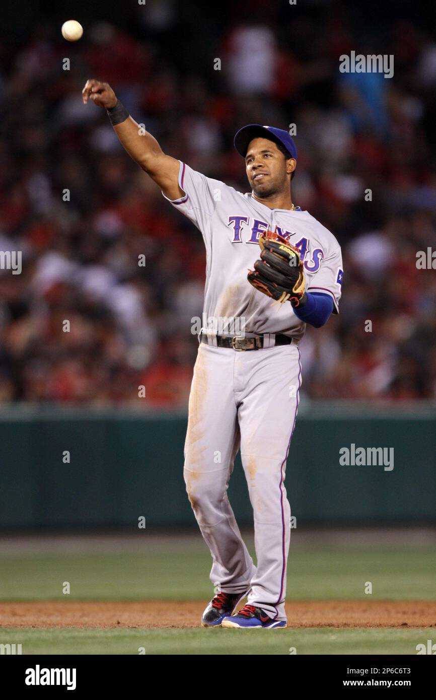Elvis Andrus #1 of the Texas Rangers makes a throw against the Los ...