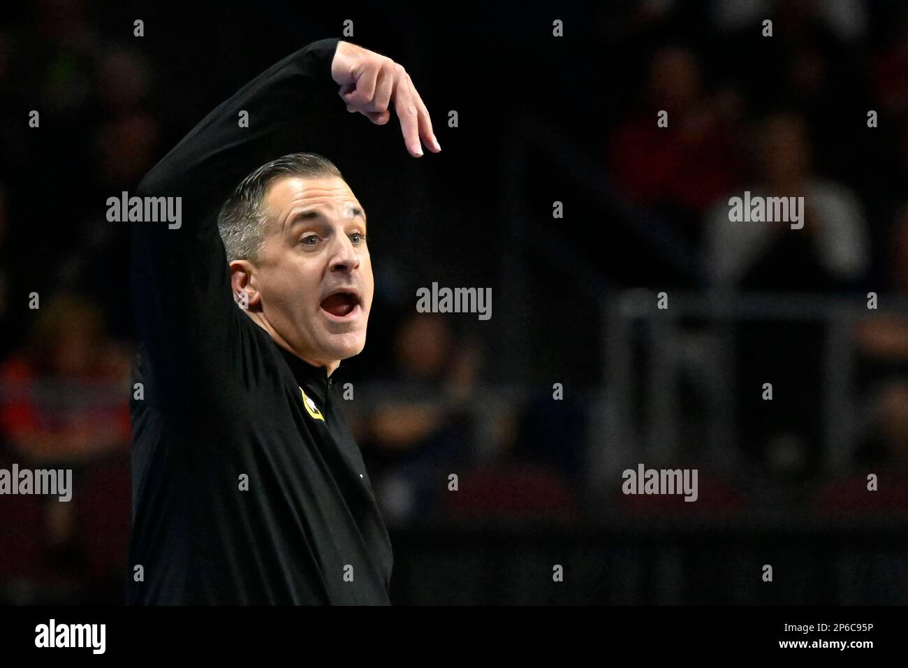 San Francisco head coach Chris Gerlufsen signals to his team during the ...