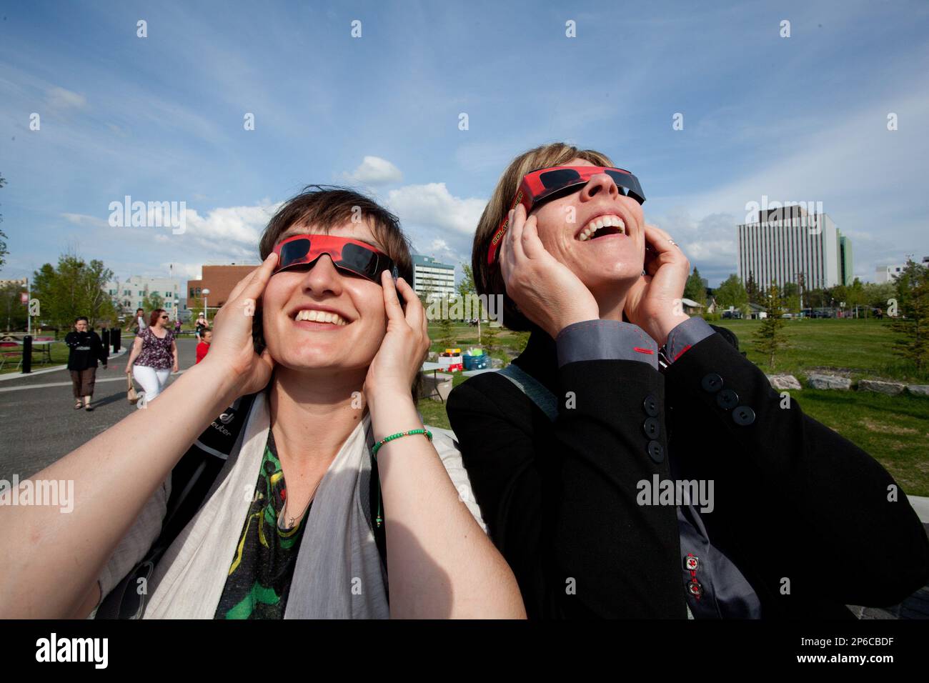 Wendy Barner and Margo Nightingale of Yellowknife peer through special ...
