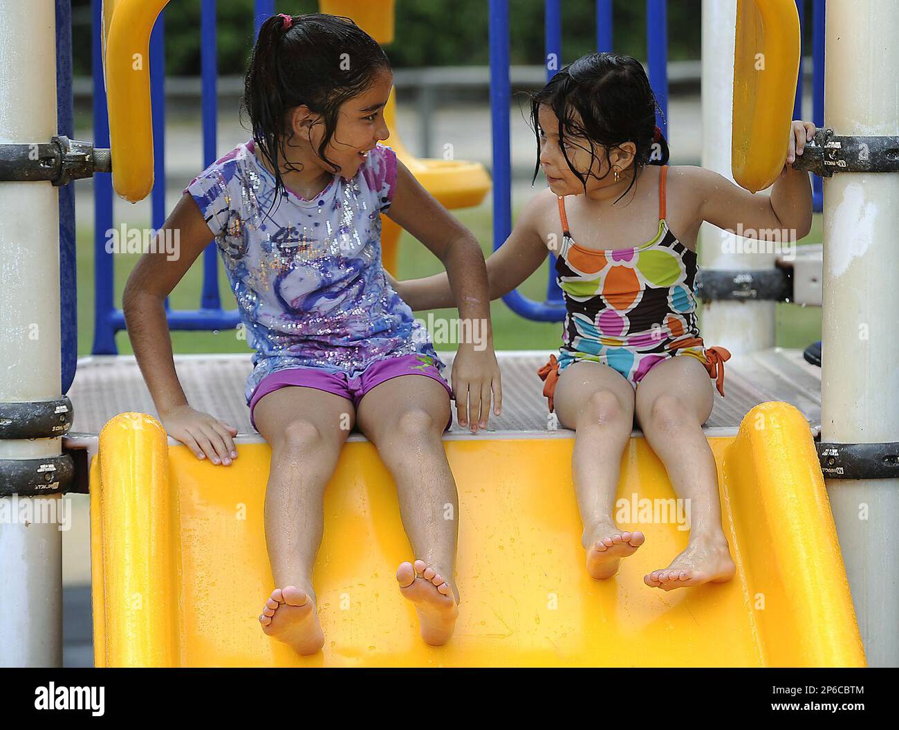 Valerie Castaneda, 7, left, and Ebony Montero, 6, count down before ...