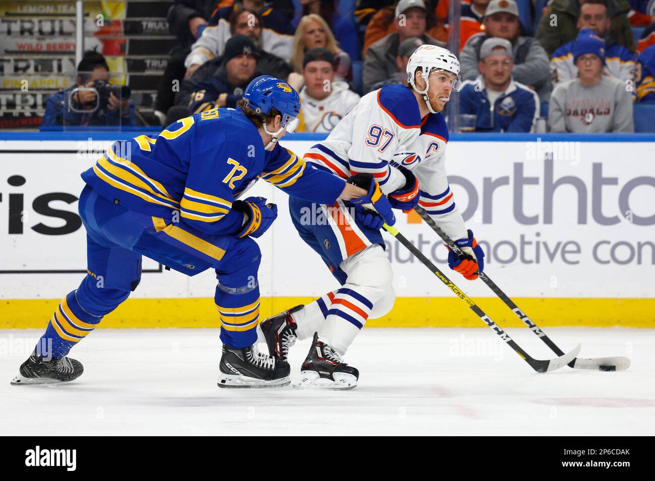 Edmonton Oilers center Connor McDavid (97) is pressured by Buffalo ...