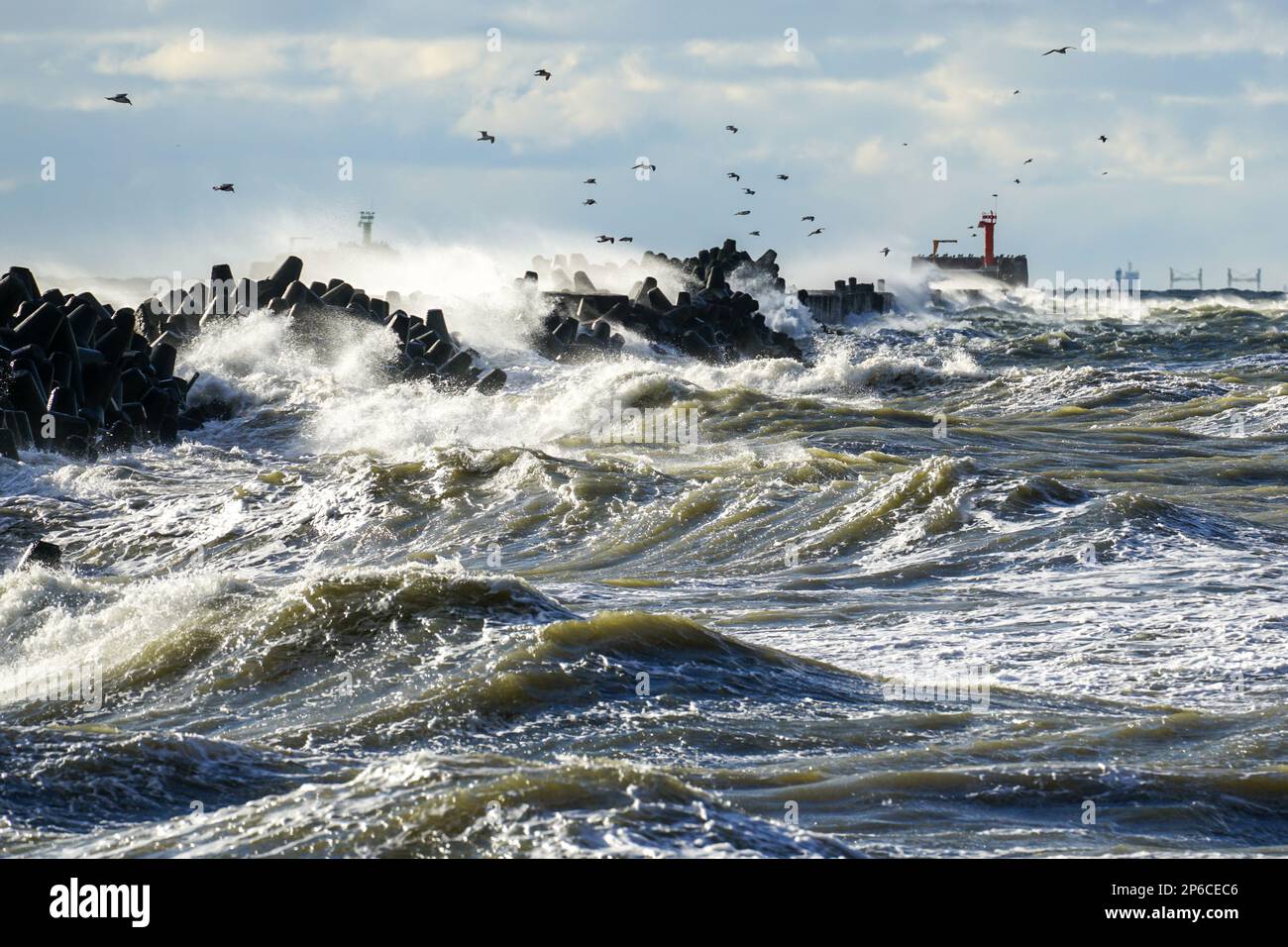 Coastal storm in the Baltic Sea, big waves crash against the concrete ...