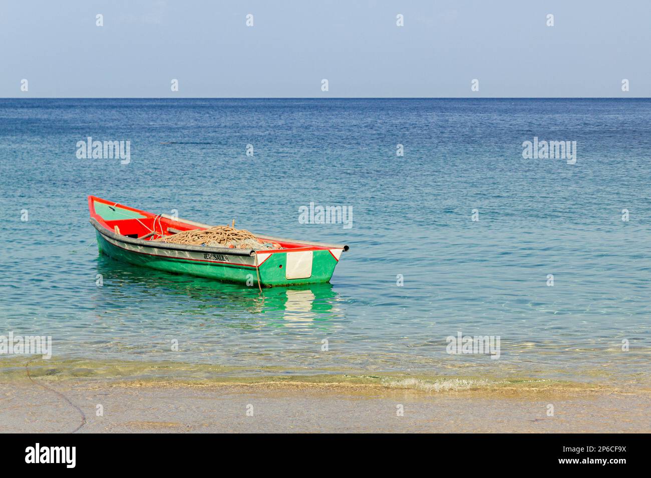 single fishing boat on the beach Stock Photo - Alamy