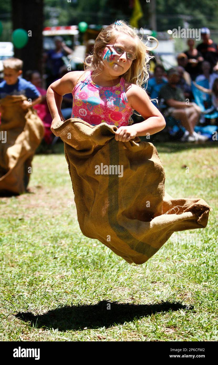 In this Saturday, June 2, 2012 photo, Kaylee Pigott takes a leap during ...