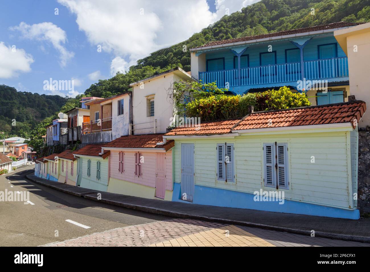 multi colored houses in french caribbean Stock Photo - Alamy