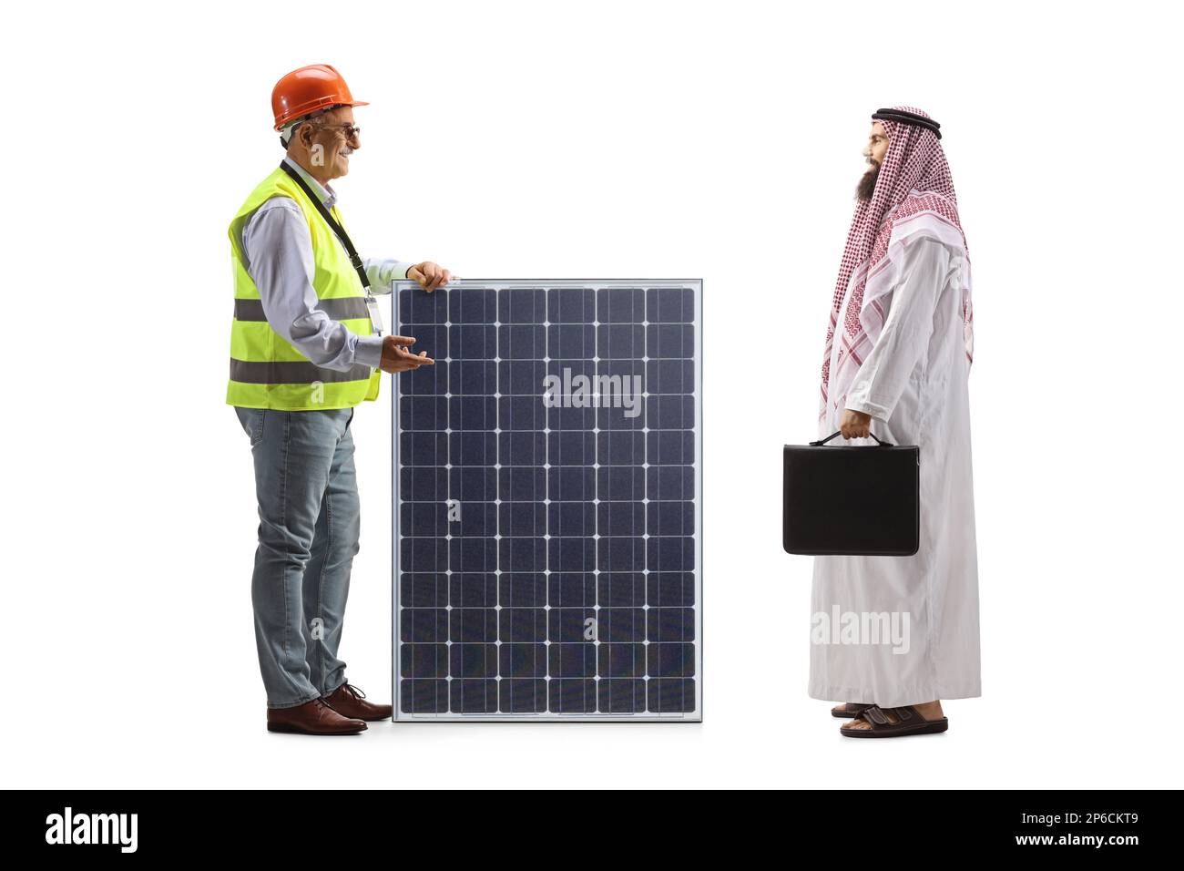 Mature male engineer talking about a solar panel with an arab ...