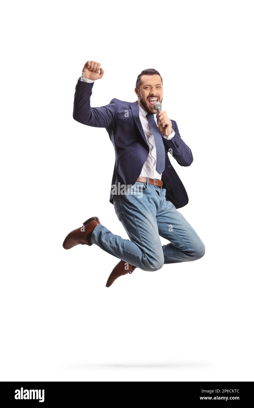 Excited male tv host with a microphone jumping isolated on white ...