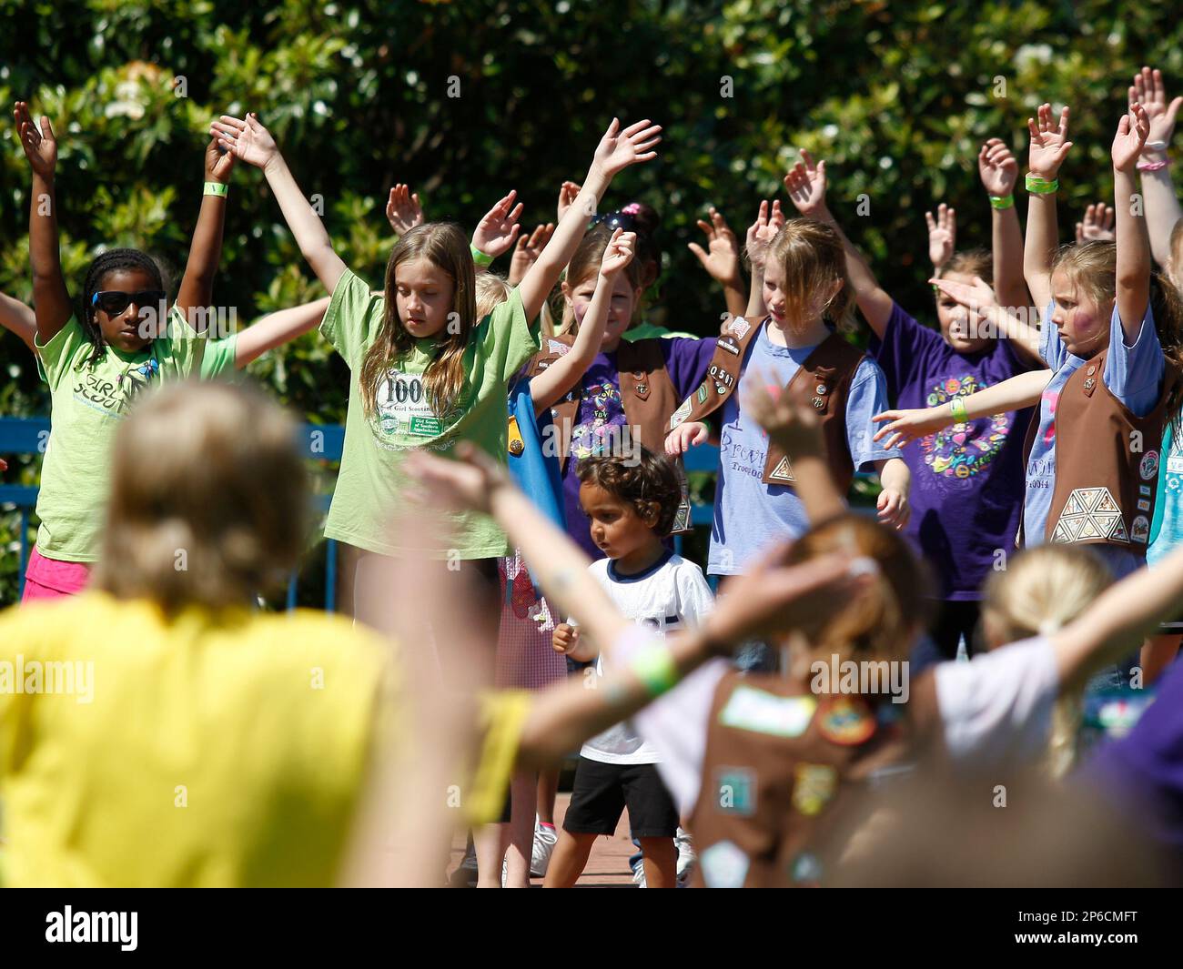 Girl scouts perform a dance in Coolidge Park in Chattanooga, Tenn., on ...