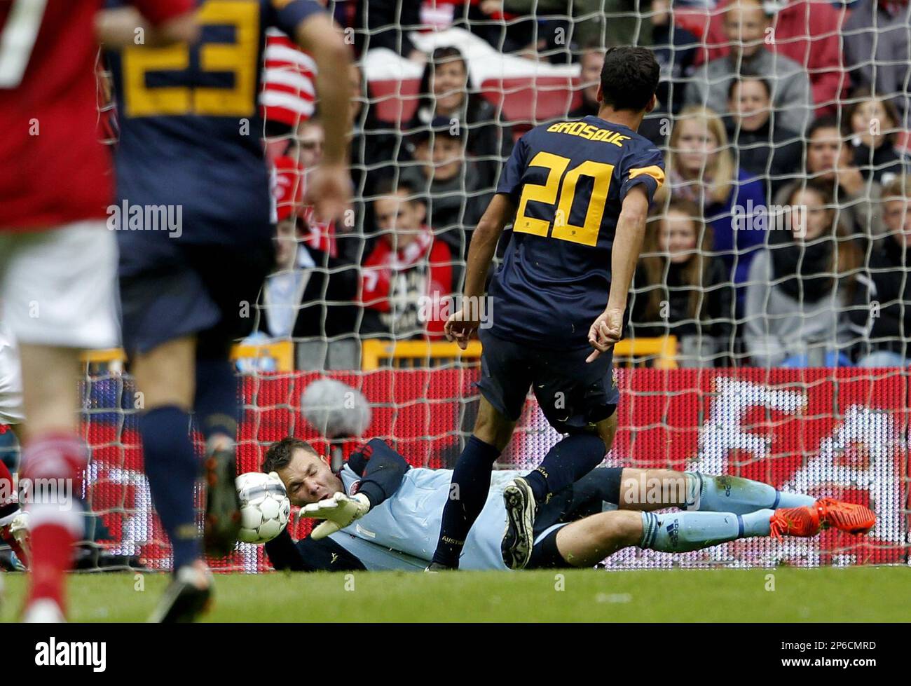 Denmark’s goalie Stephan Andersen saves an attempt from Australia’s ...