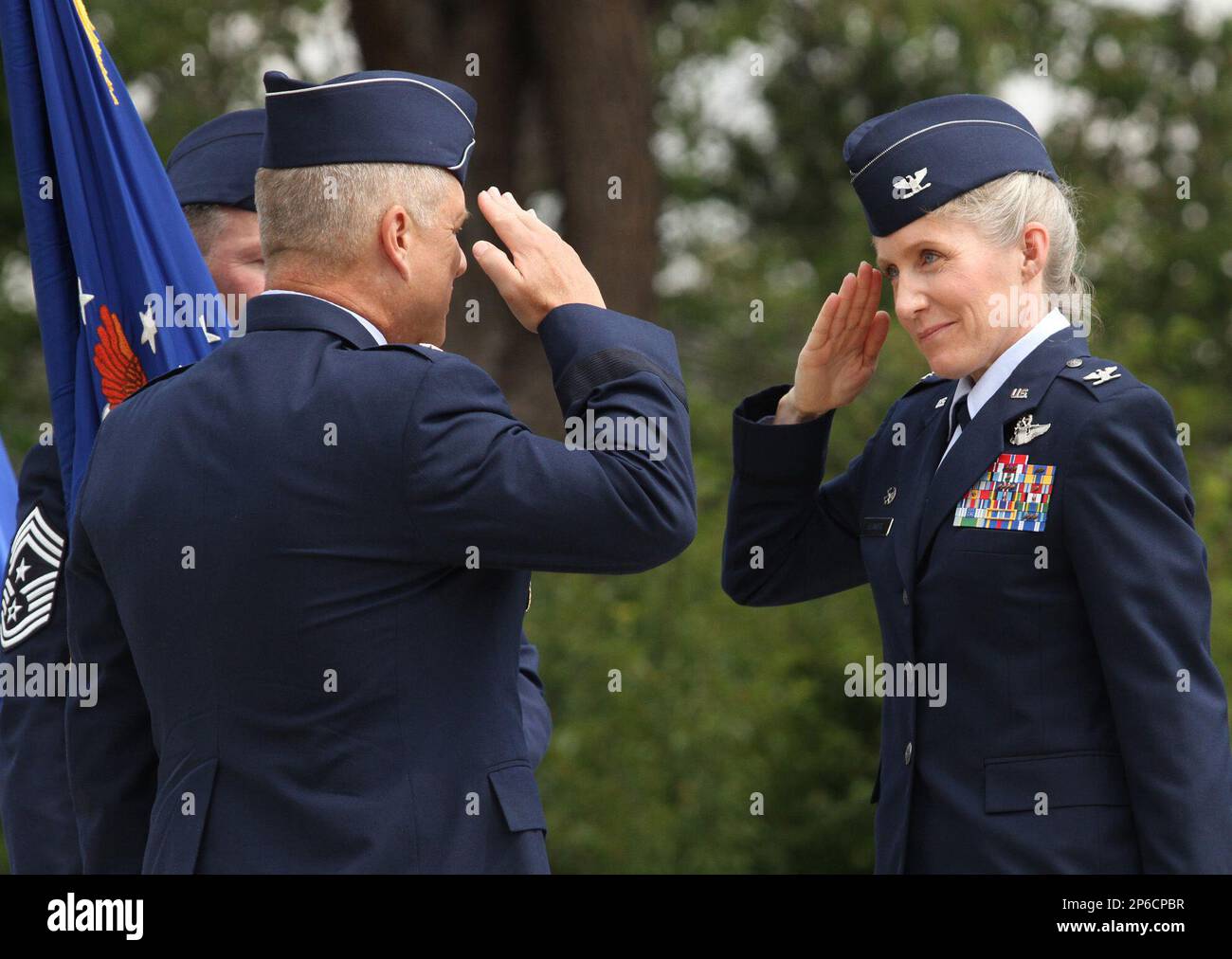 Col. Jeannie Leavitt, right, salutes 9th Air Force Commander Maj. Gen ...