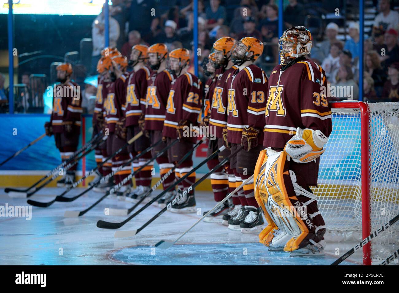 Minnesota goalie Kent Patterson, right, stands with the team prior to ...