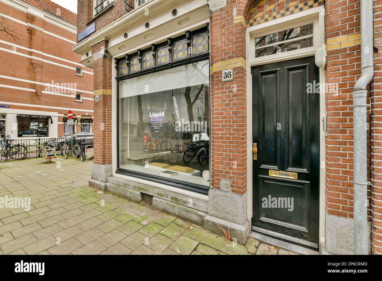 Storefront amsterdam bicycles hi-res stock photography and images - Alamy