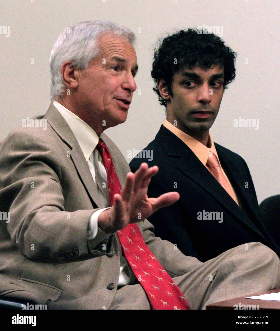 Dharun Ravi, right, listens to his attorney, Joseph Benedict during a ...