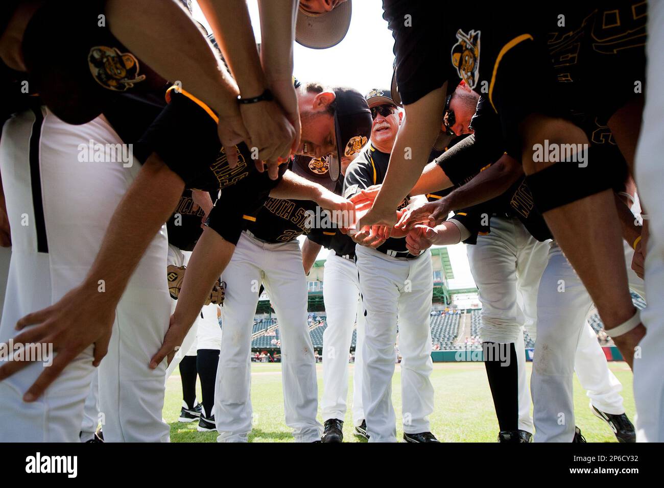 Head Coach Gene Stephenson (10) of the Wichita State Shockers tries to ...