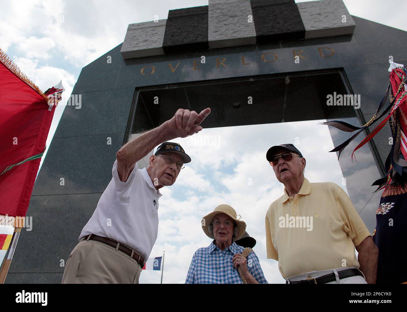 In a June 6, 2010 photo, D-Day veteran Bob Slaughter, left, and his ...