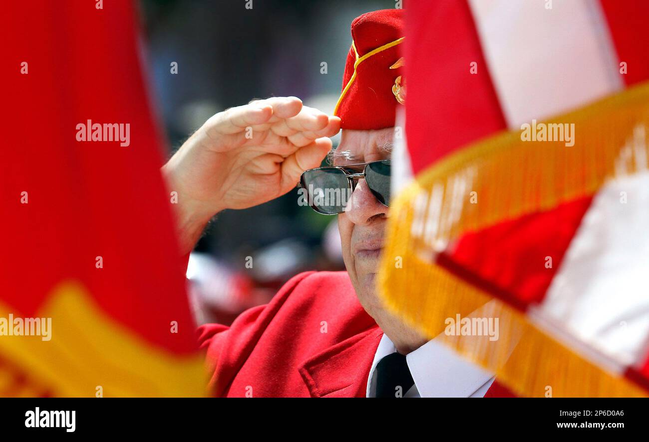 Joseph Colwell of the Marine Corps League stands at attention during ...