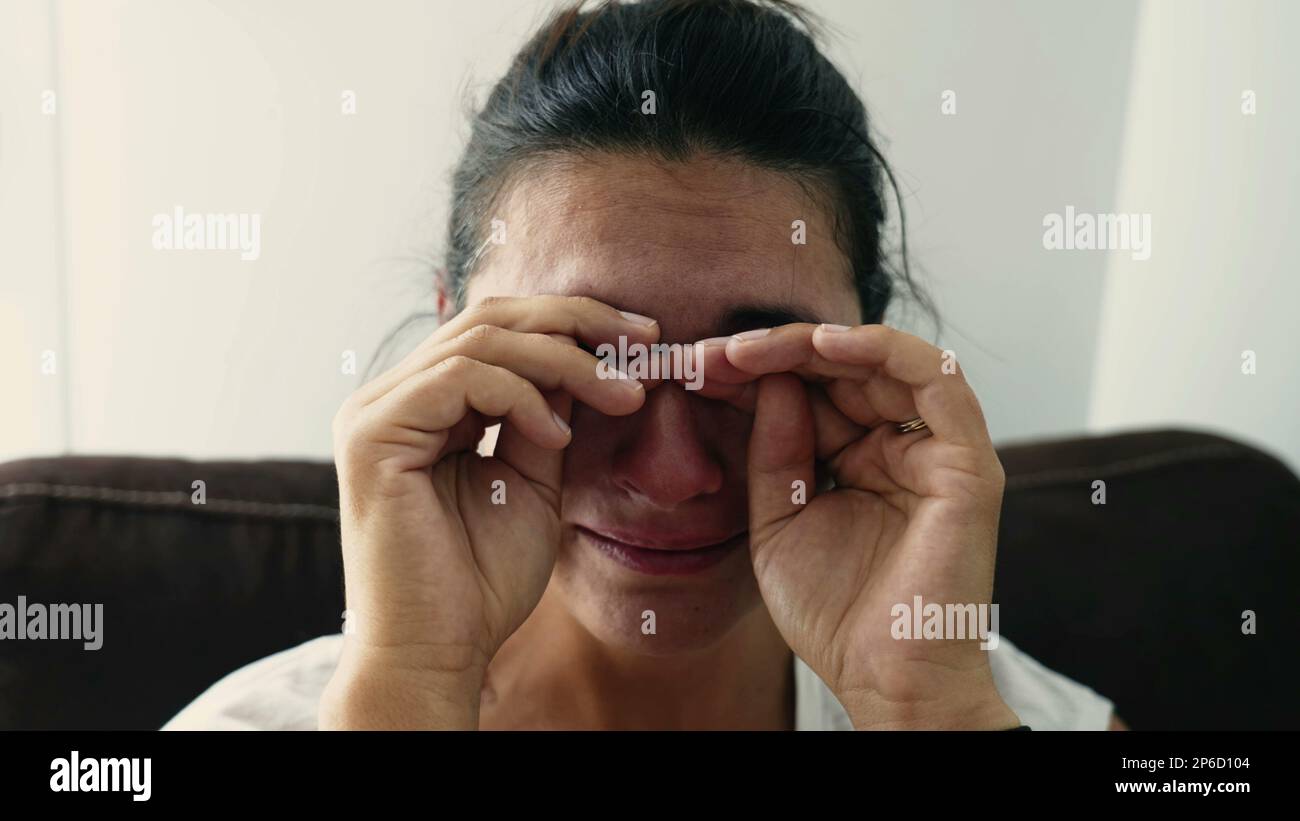 A desperate woman suffering from mental breakdown. Troubled 30s female ...