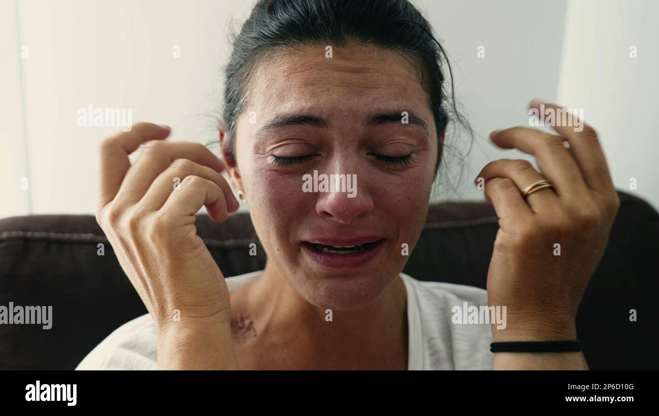 A desperate woman suffering from mental breakdown. Troubled 30s female ...