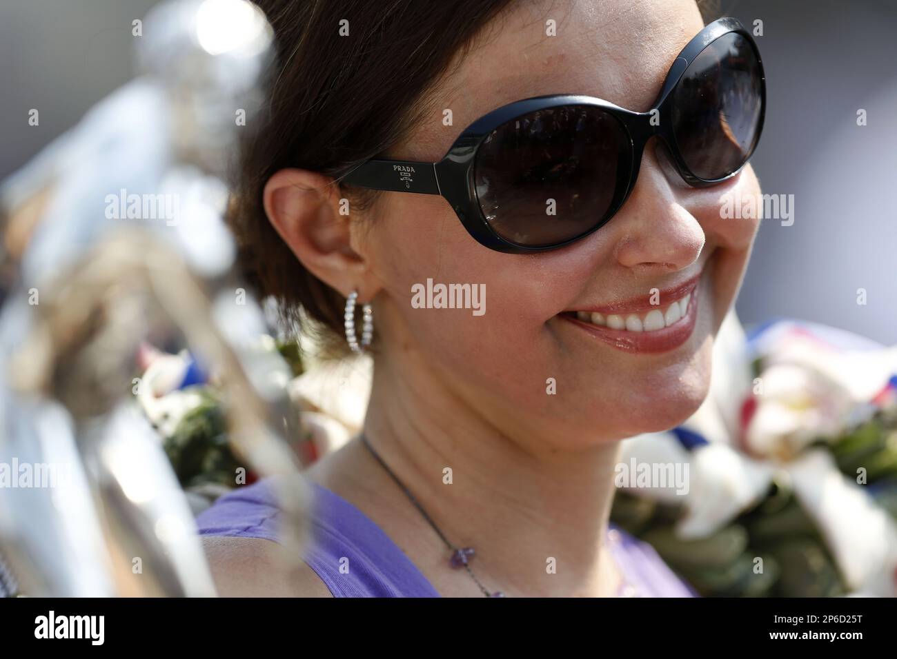 Winner Dario Franchitti's wife Ashley Judd poses with the Borg-Warner ...