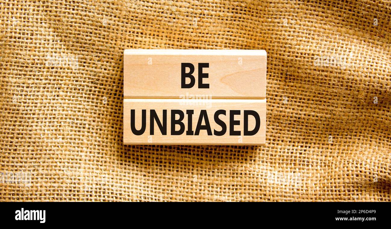 Be unbiased symbol. Concept words Be unbiased on wooden block ...
