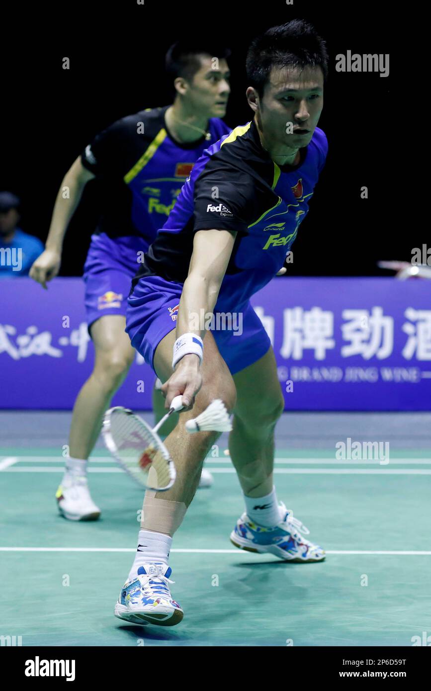 China's Cai Yun (R) and Fu Haifeng (L) in action during a match against ...