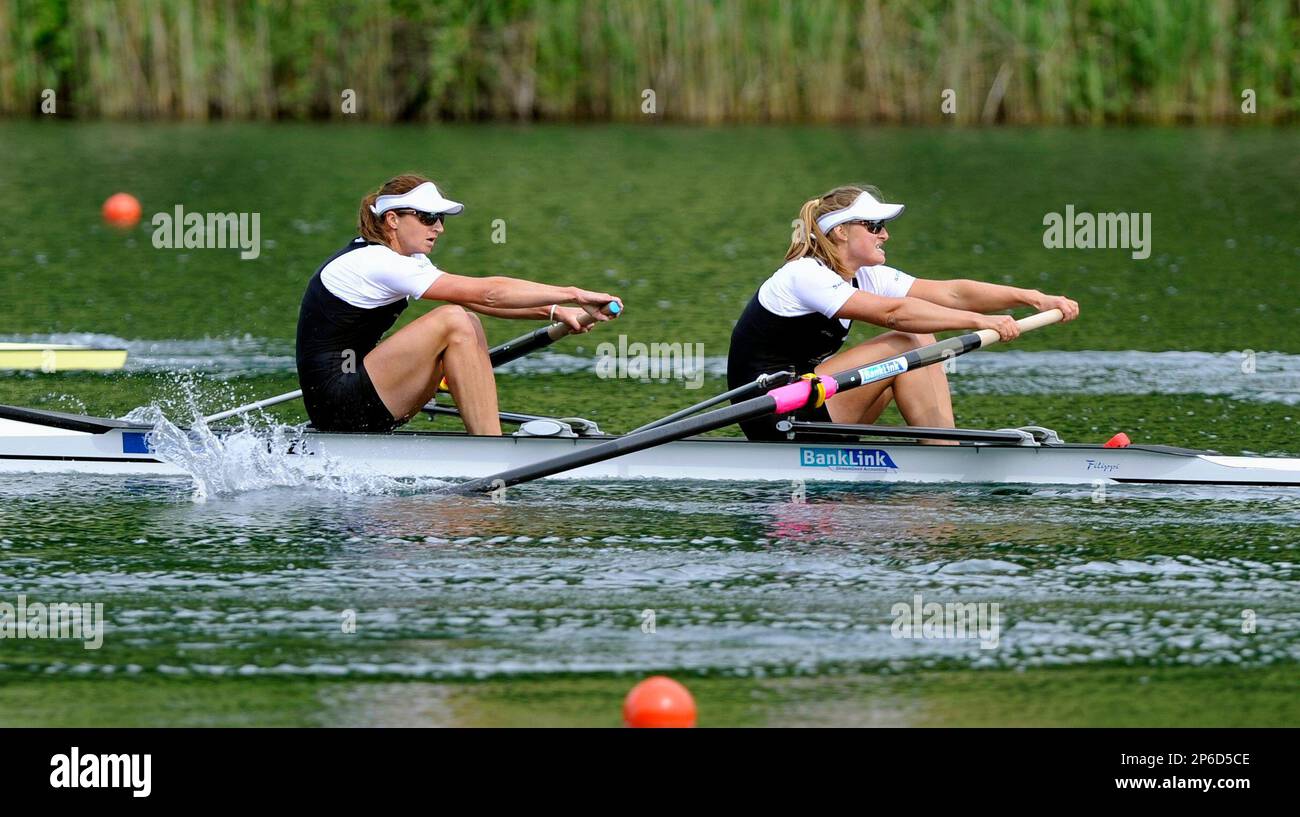 Juliette Haigh, left and Rebecca Scown of New Zealand, on the way to ...