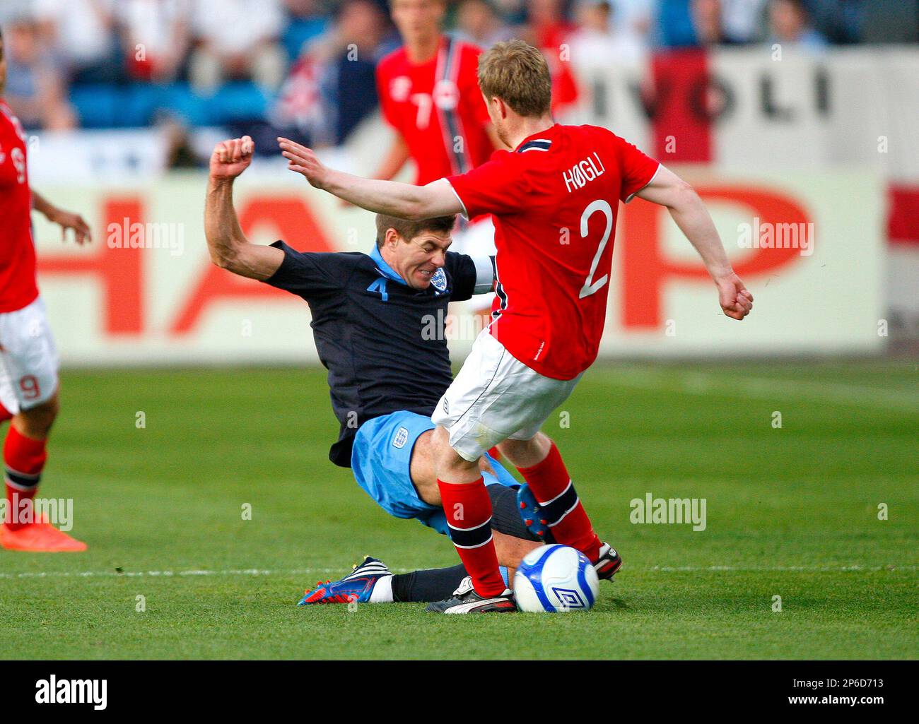 Steven Gerrard of England fouls Tom Hogli of Norway..International ...