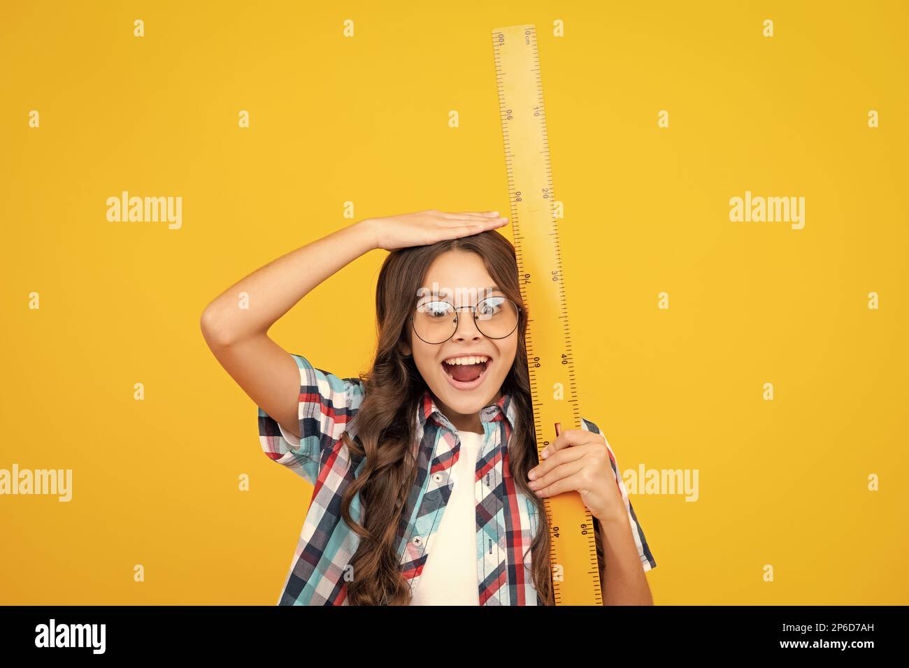 Height measurement teenager hi-res stock photography and images - Alamy