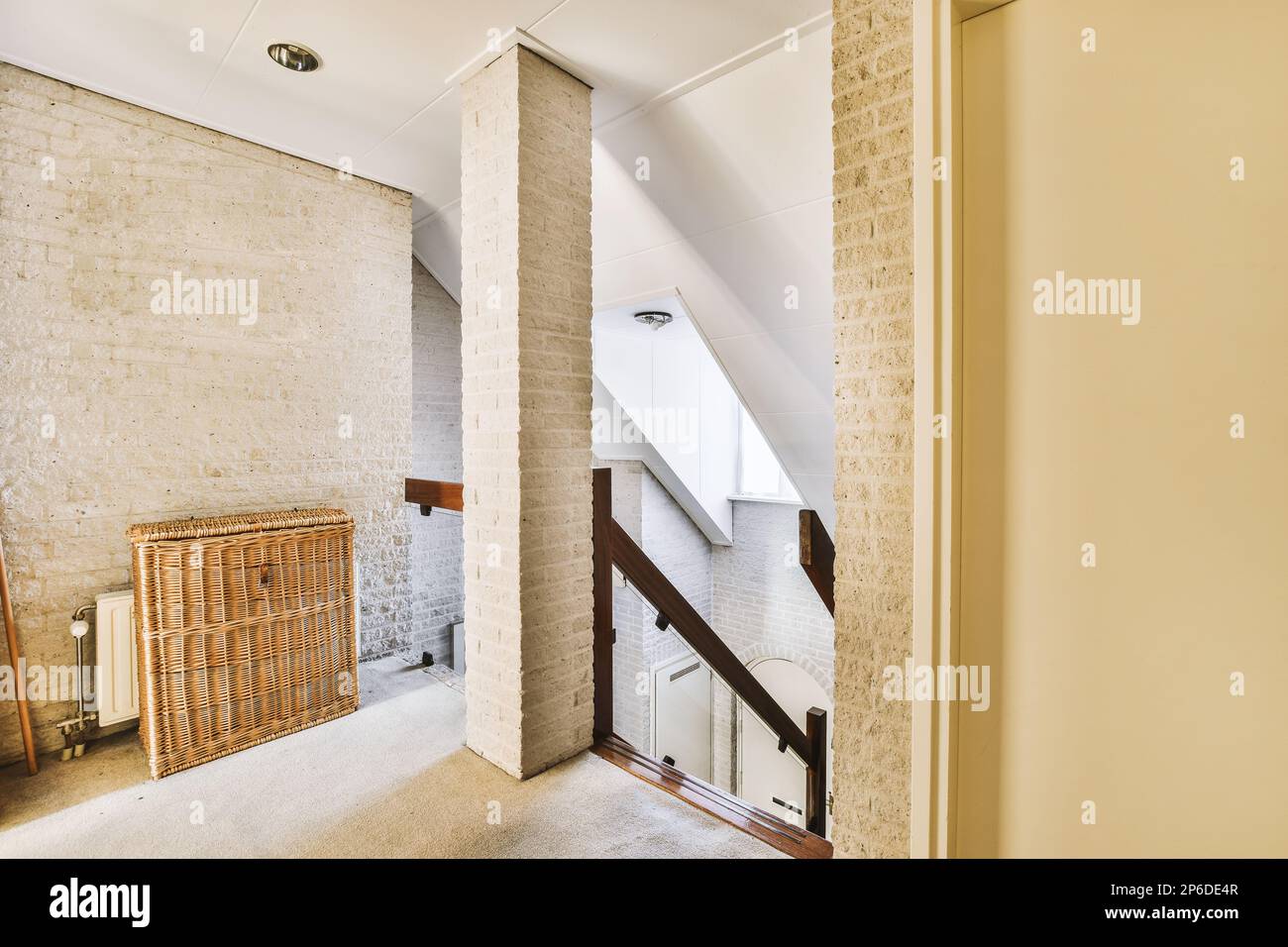 the inside of a house with an open door and stairs leading up to ...