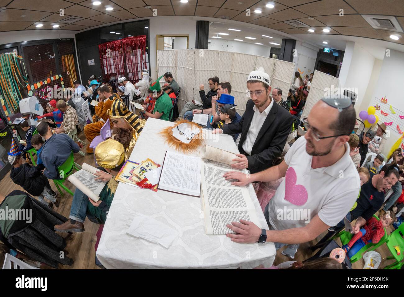 Harish, Israel. Reading of the scroll of Esther during the holiday of ...