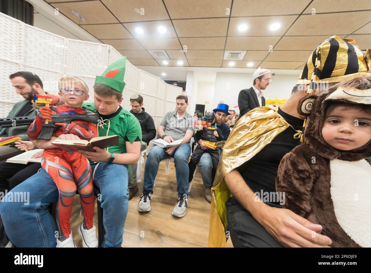 Harish, Israel. Reading of the scroll of Esther during the Jewish ...