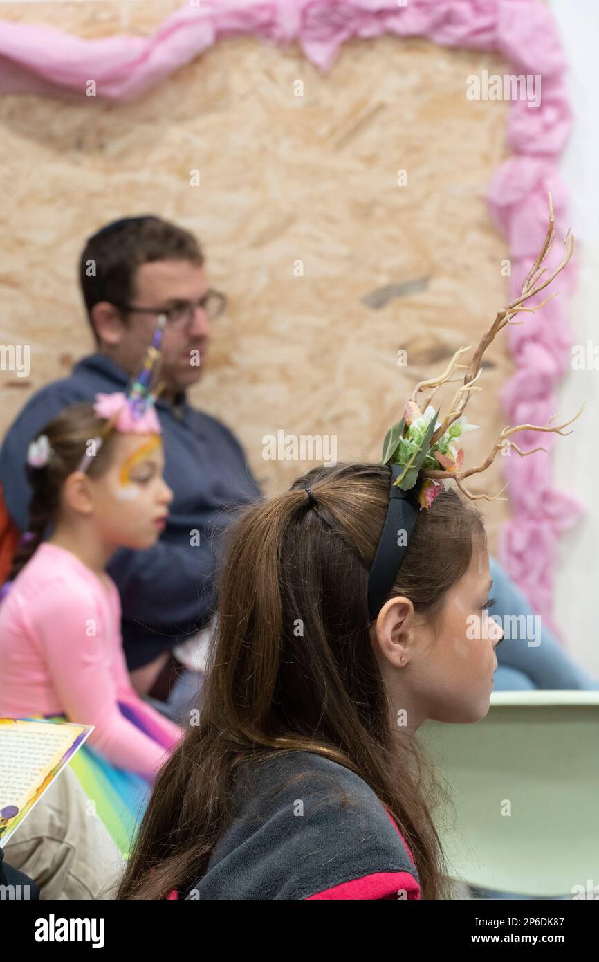 Harish, Israel. Reading of the scroll of Esther during the Jewish ...