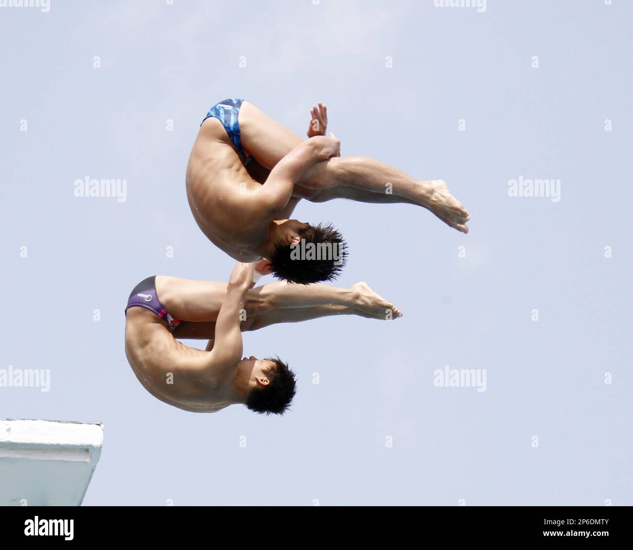 Huo Liang, top, and Aisen Chen, both of China, win the AT&T USA Diving ...