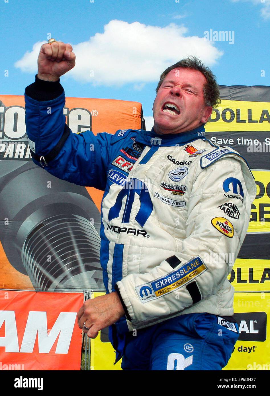 Pro Stock driver Allen Johnson celebrates his win at the NHRA Dollar ...