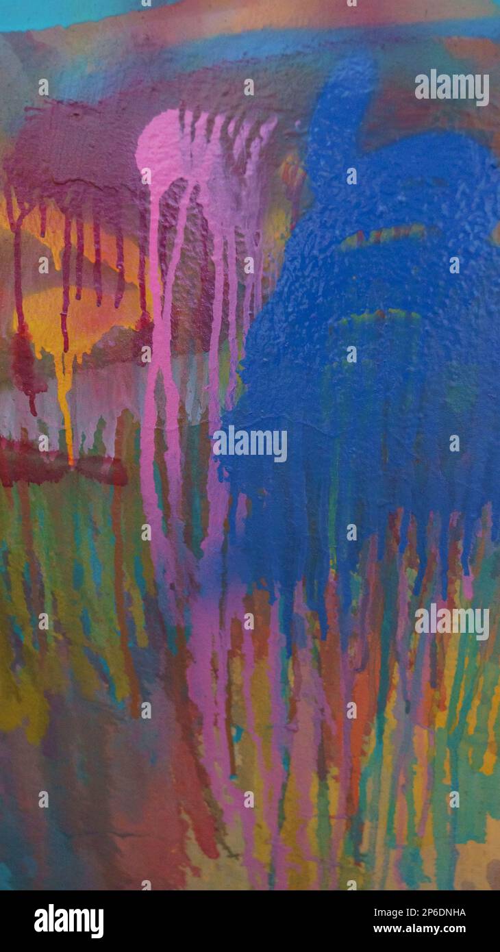 Colourful paint splashes on the wall. Vertical Stock Photo - Alamy