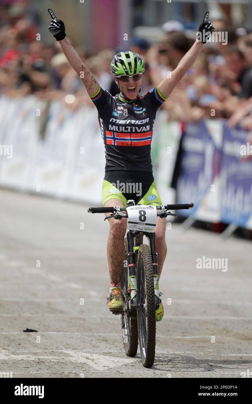 Norwegian Gunn-Rita Dahle of Multivan Merida Biking Team celebrates as ...
