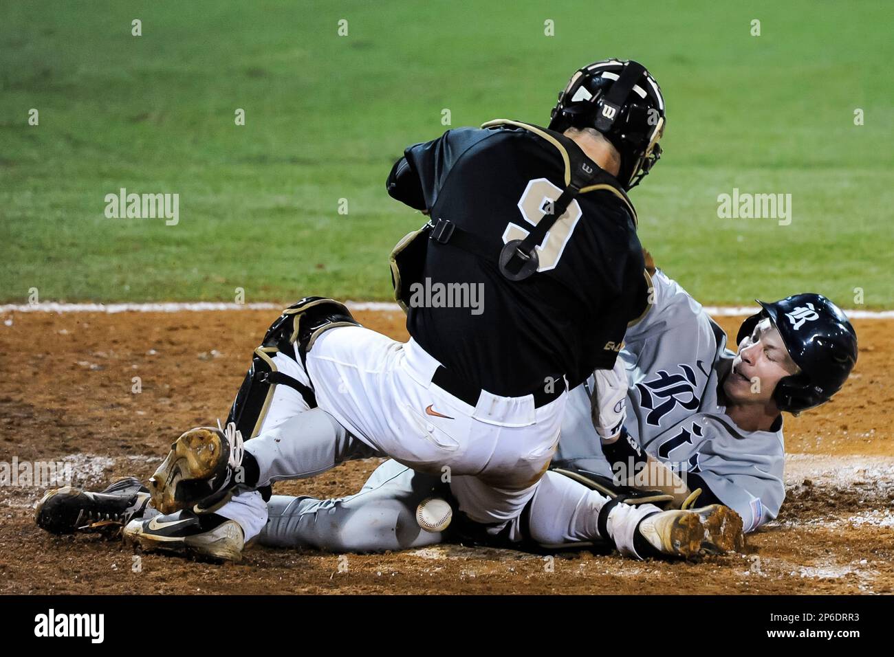 May 18, 2012: UCF catcher Ryan Breen (9) looses the ball as a Rice ...