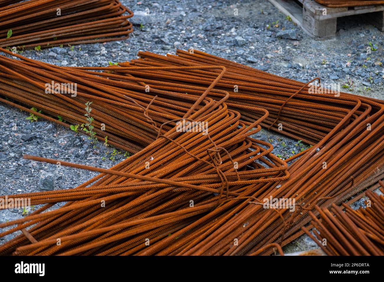 Piles of rusty rebar ready to be used at a construction site Stock ...
