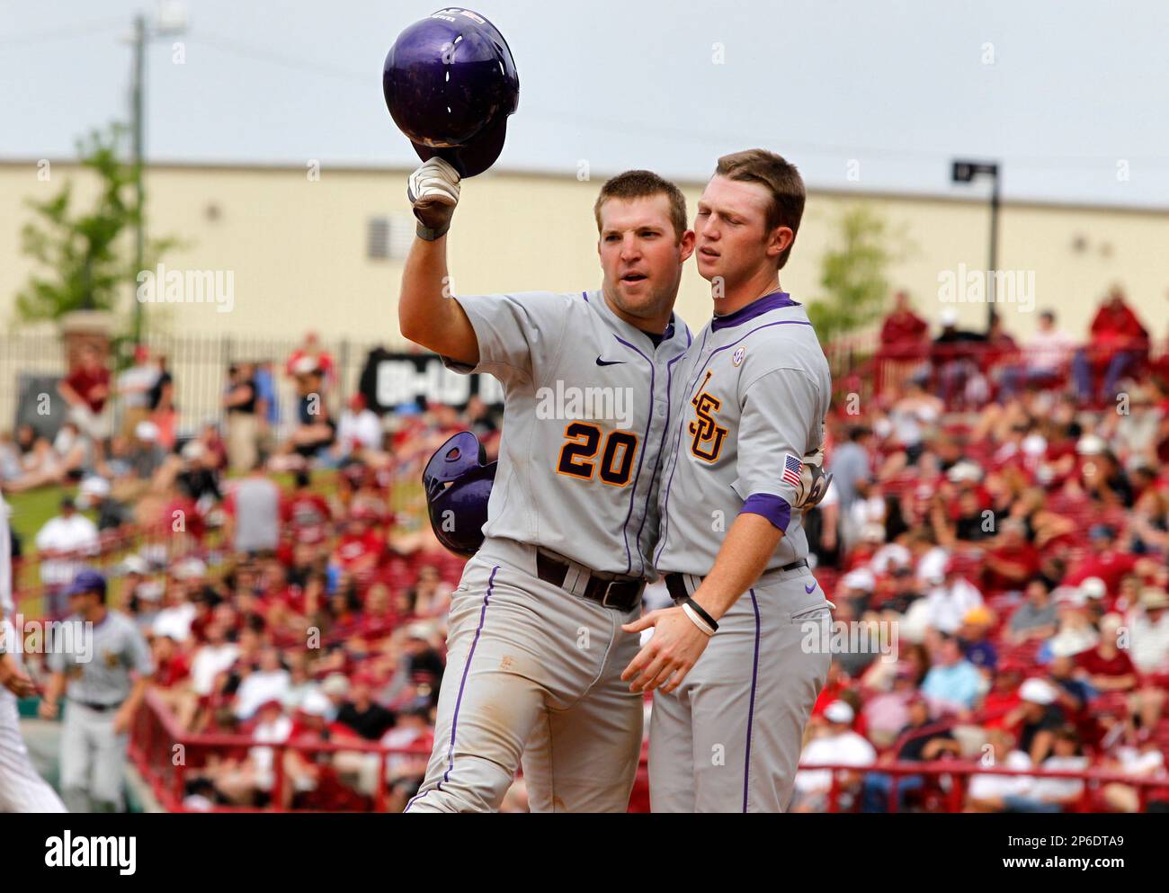 LSU's Jordy Snikeris (20) celebrates his home run in the ninth inning ...