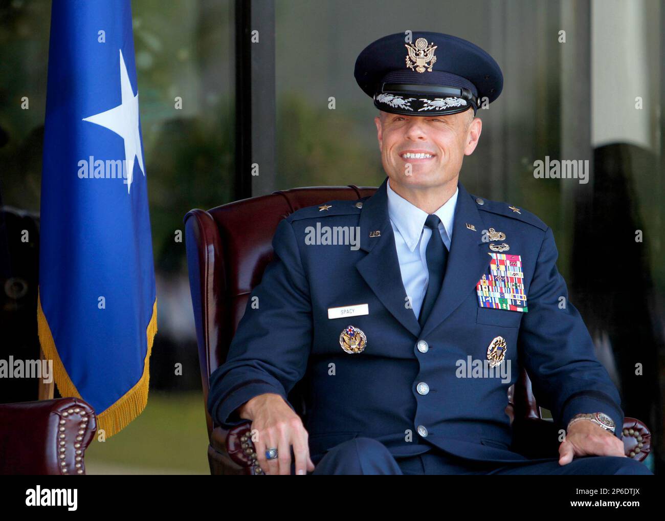 Brig. Gen. Bradley Spacy listens as Maj. Gen. Leonard Patrick speaks ...