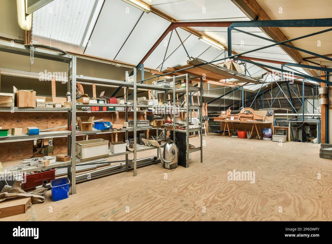 the inside of a building that is being used as a workshop for ...