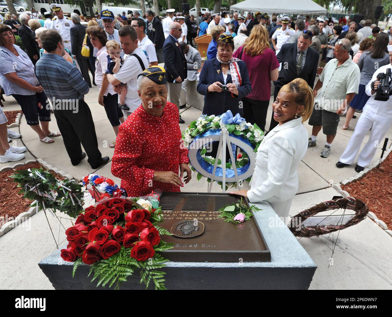 Ruth Penn from the Fleet Reserve Association, foreground left, and ...