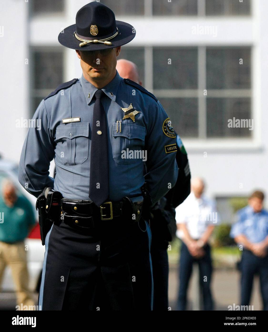 Oregon State Police Lt. Doug Ladd attends a memorial service at the ...