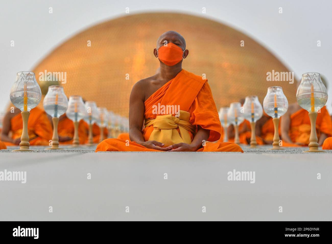 Pathum Thani, Thailand. 06th Mar, 2023. Buddhist monks sitting in the ...