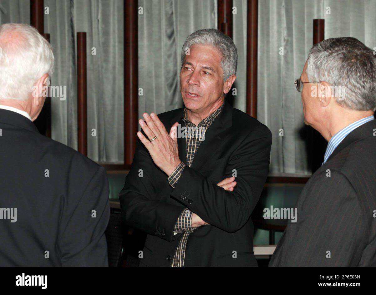 Kevin DeSanctis, Chief Executive Officer, Revel, center, talks with ...