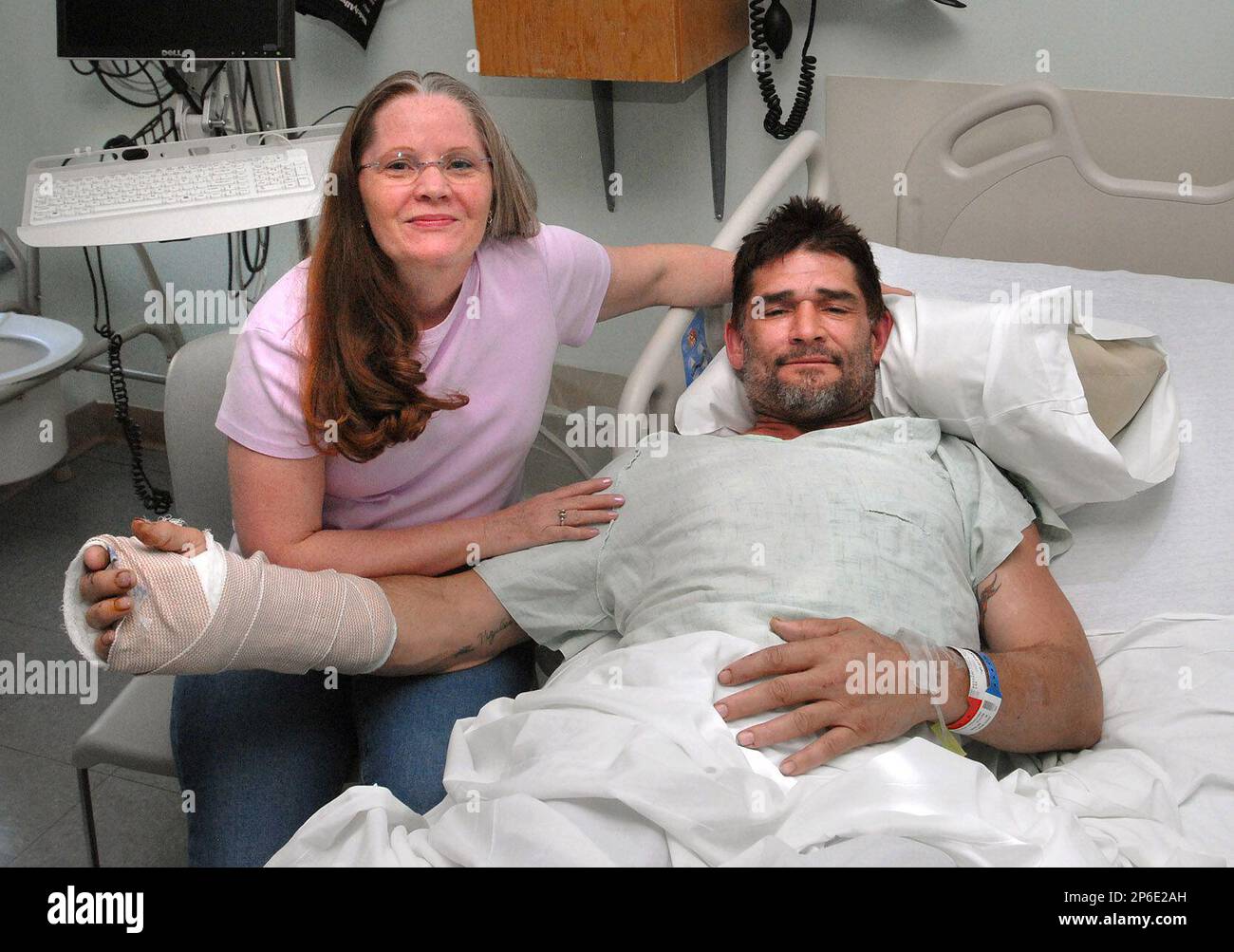 Mica Craig, right, of Clarkston, Wash., rests at St Joseph Regional ...