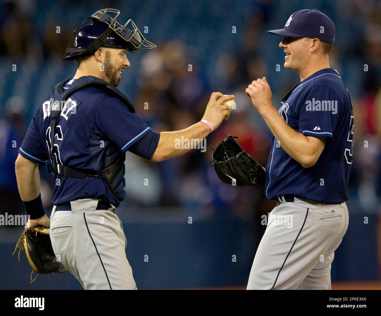 Tampa Bay Rays catcher Chris Gimenez, left, and pitcher Jake McGee ...