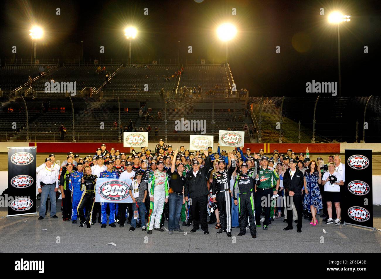 The Hendrick Motorsports teams and drivers celebrate with Rick Hendrick ...
