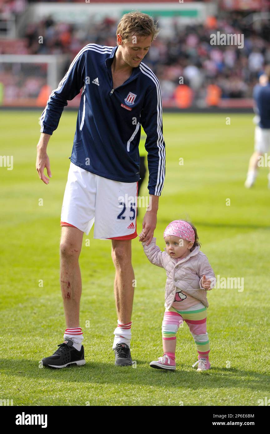 Peter Crouch of Stoke City with his daughter Sophia Ruby following the ...