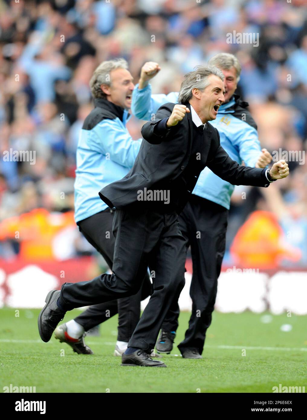 Roberto Mancini manager of Manchester City celebrates .Barclays Premier ...